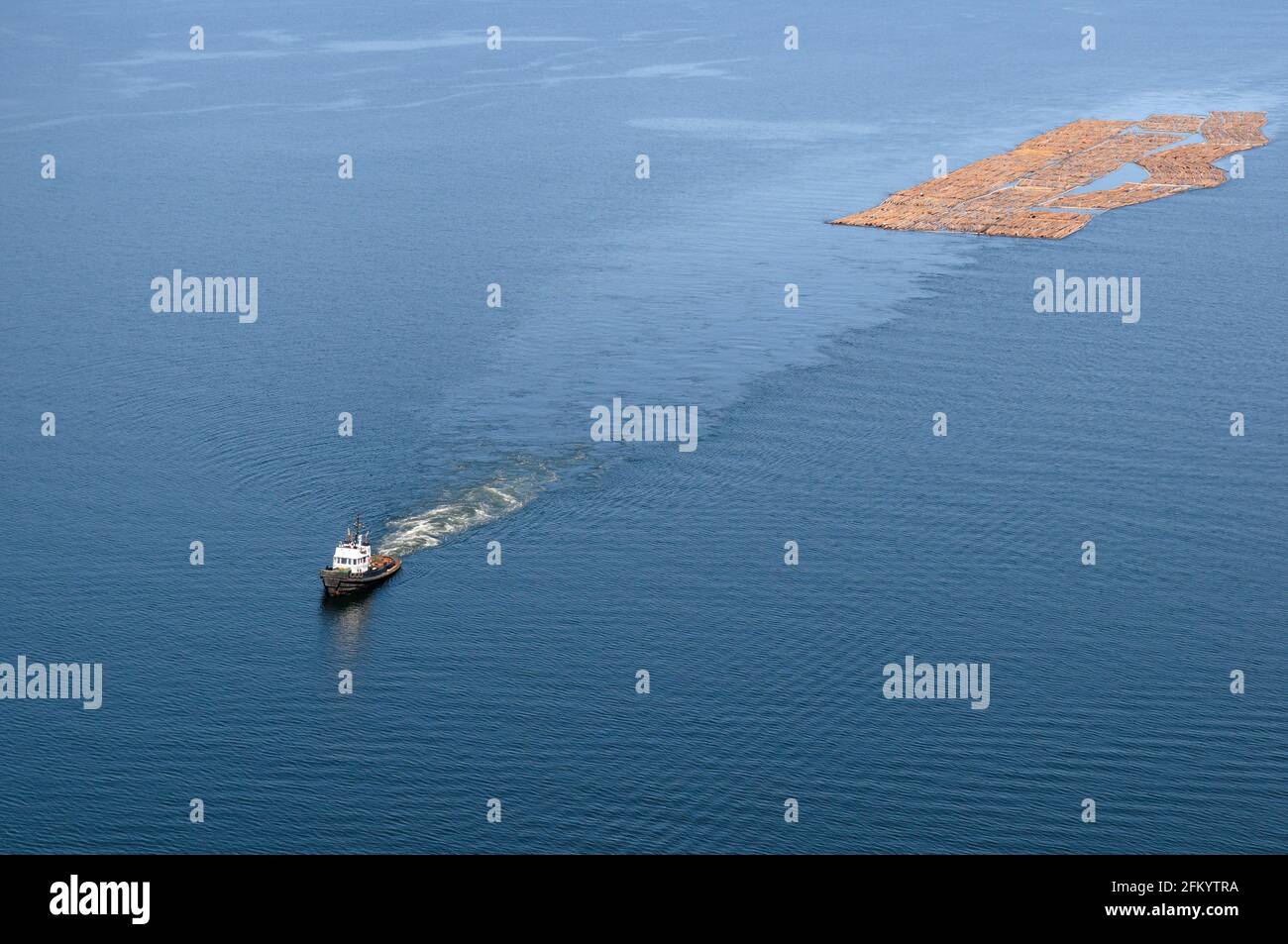 Aerial picture of a tug and log booms from the Crofton Mill, Crofton ...
