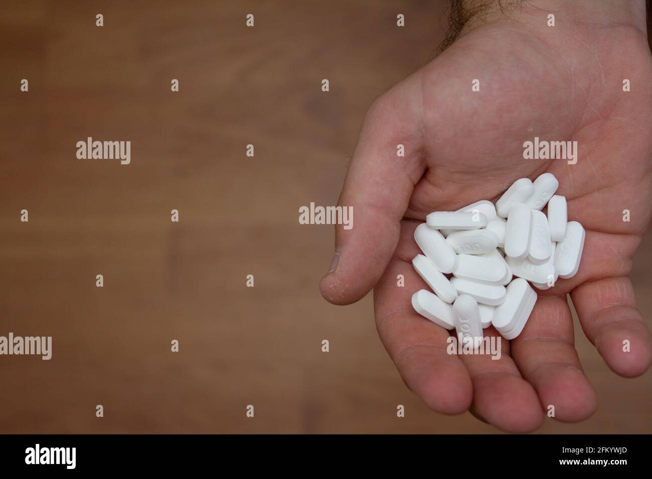 pill packets in hands Stock Photo - Alamy