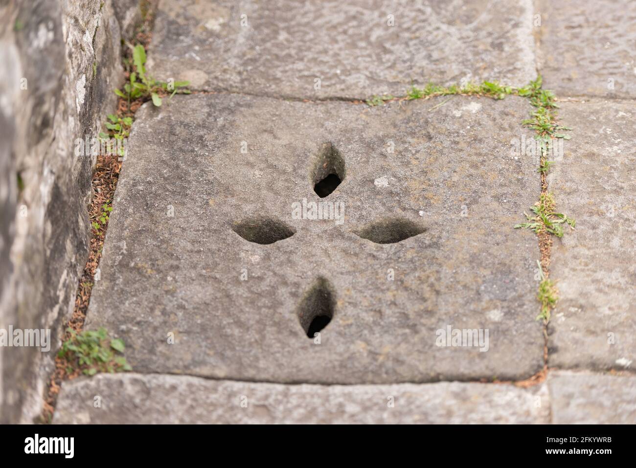 Stormwater runoff in the stone pavement of a medieval city. Sewers ...