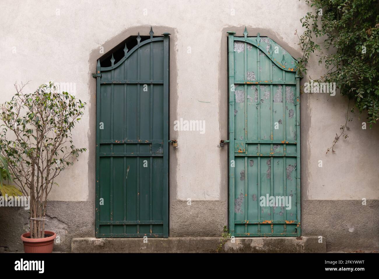 Very strange gate. The metal gate was cut in half and the entrance was ...