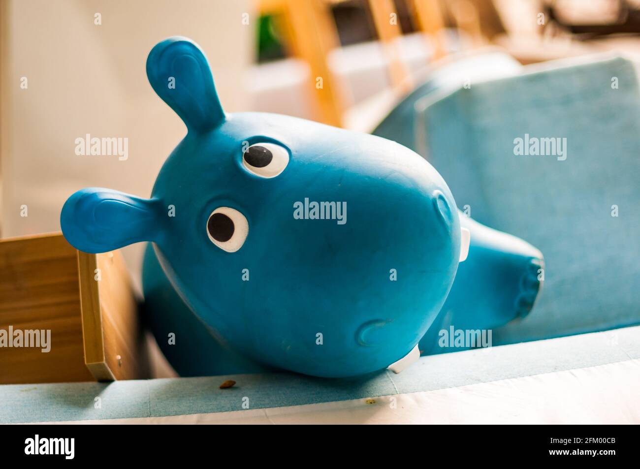 A forlorn looking blue hippo model, possibly from Freshippo, discarded ...