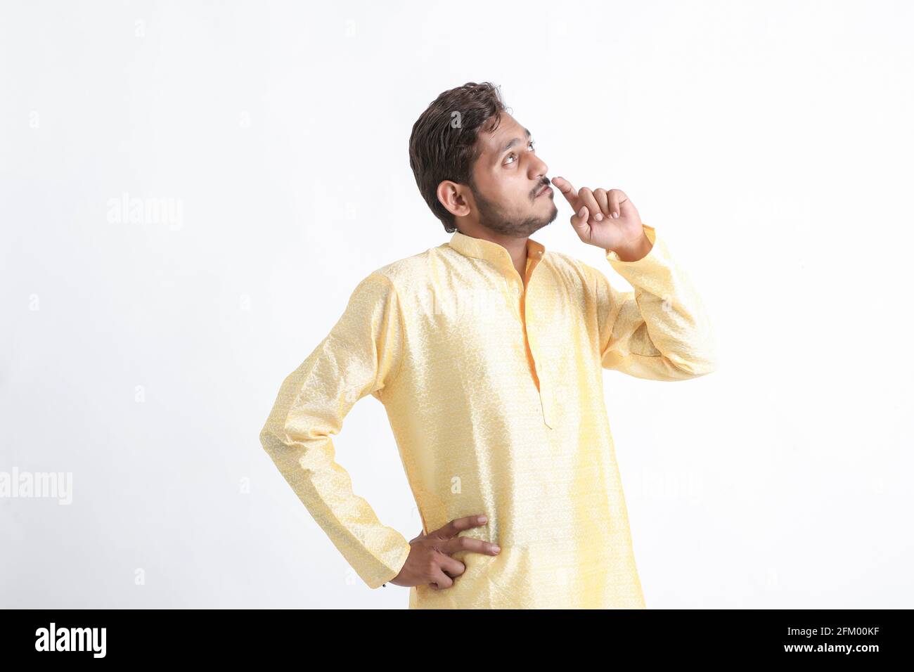 Indian man showing thinking expression on white background Stock Photo ...