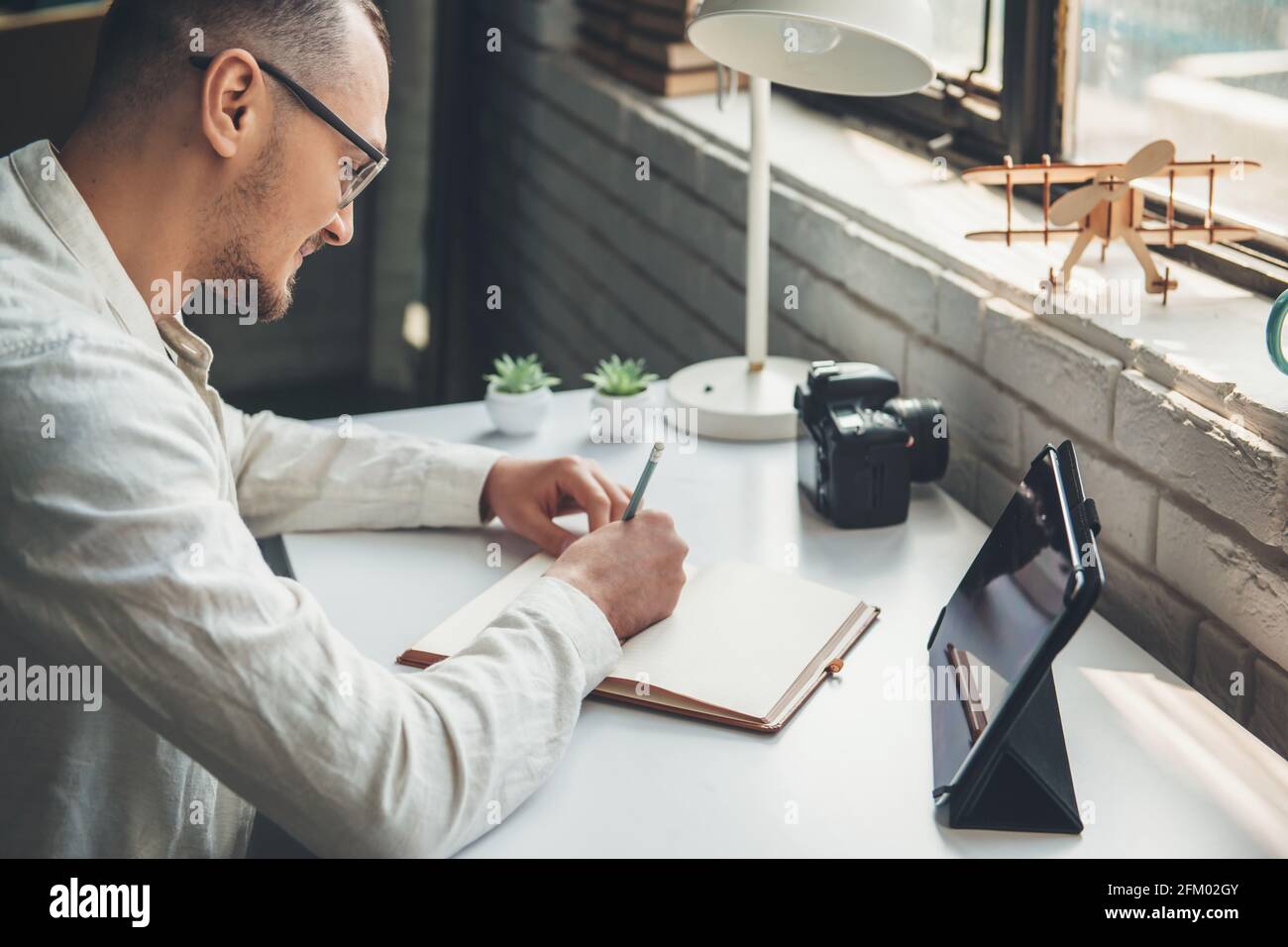 Professional photographer tablet in restaurant hi-res stock photography ...