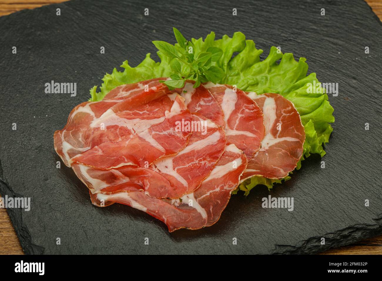 Delicous Smoked pork neck slices snack Stock Photo - Alamy