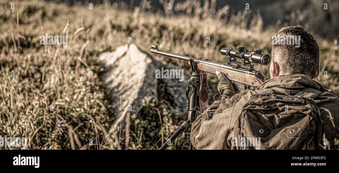 Hunting period. Hunter with hunting gun and hunting form to hunt ...
