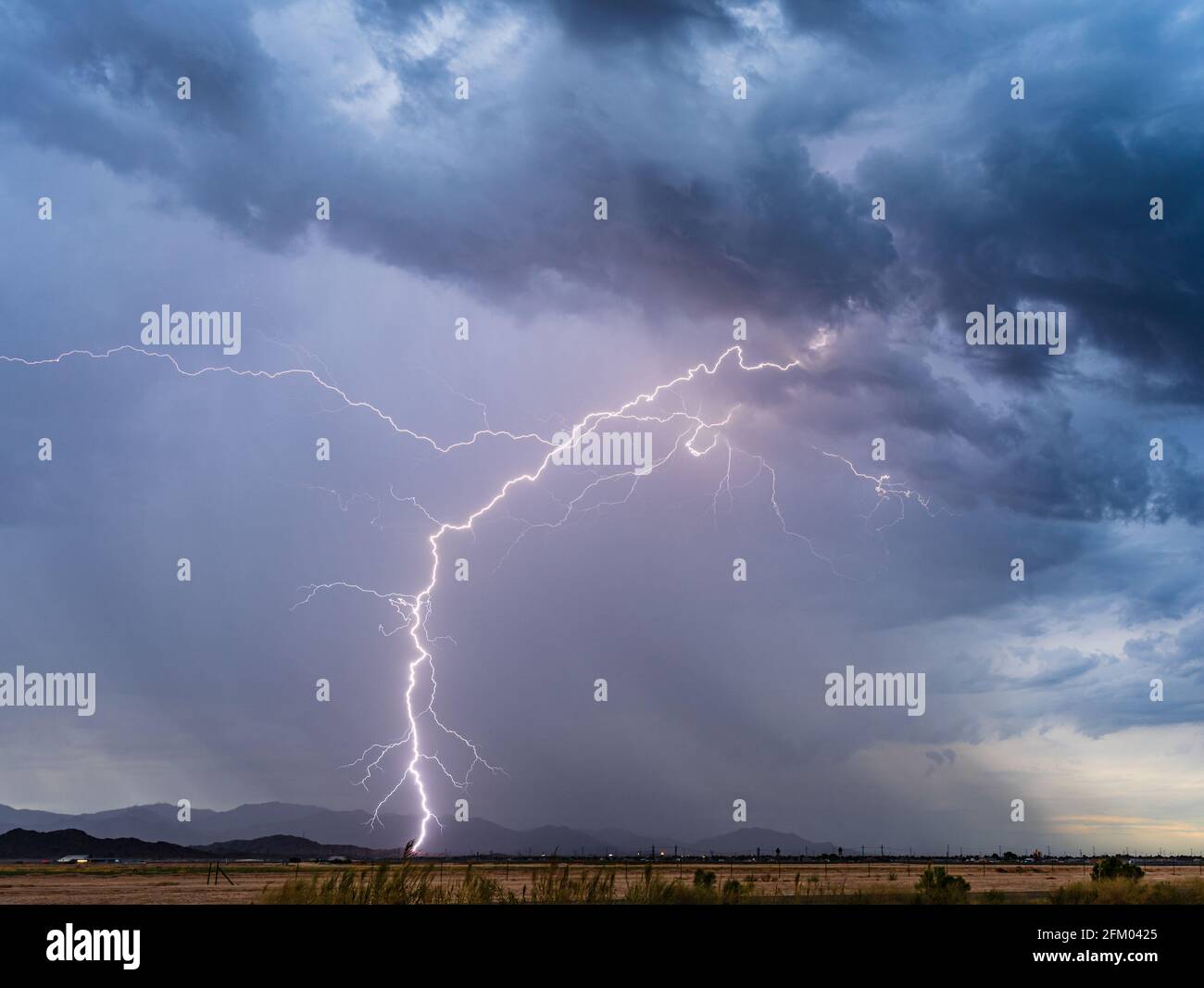 Blue Hour Monsoon Lightning Strike Stock Photo - Alamy