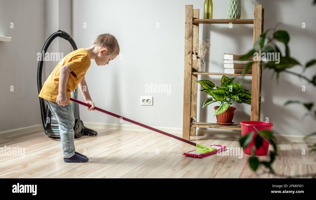 Boy mopping a floor hi-res stock photography and images - Alamy