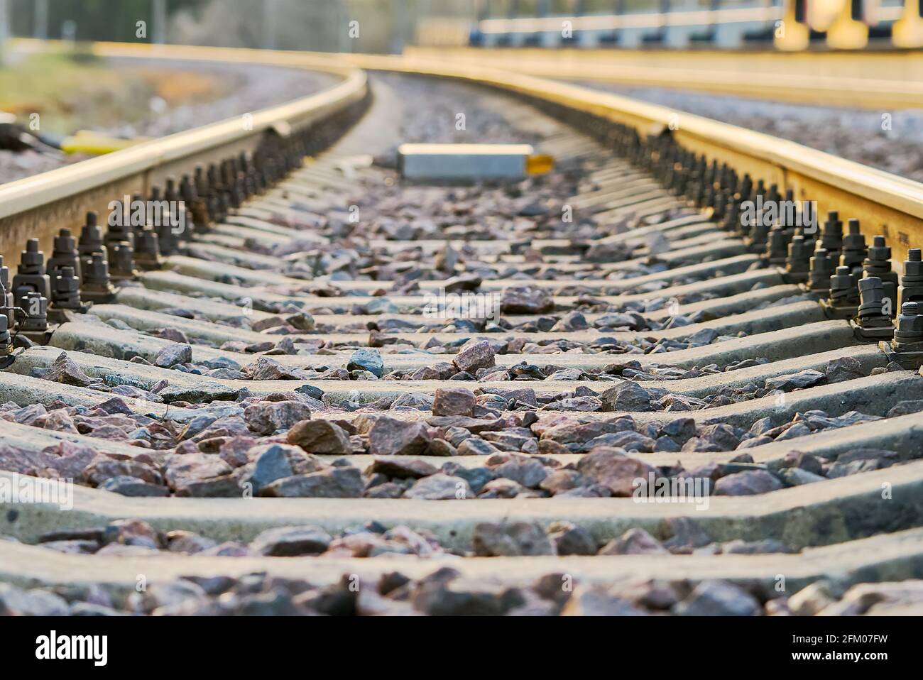 railroad rails on concrete sleepers. updated railway for high-speed ...