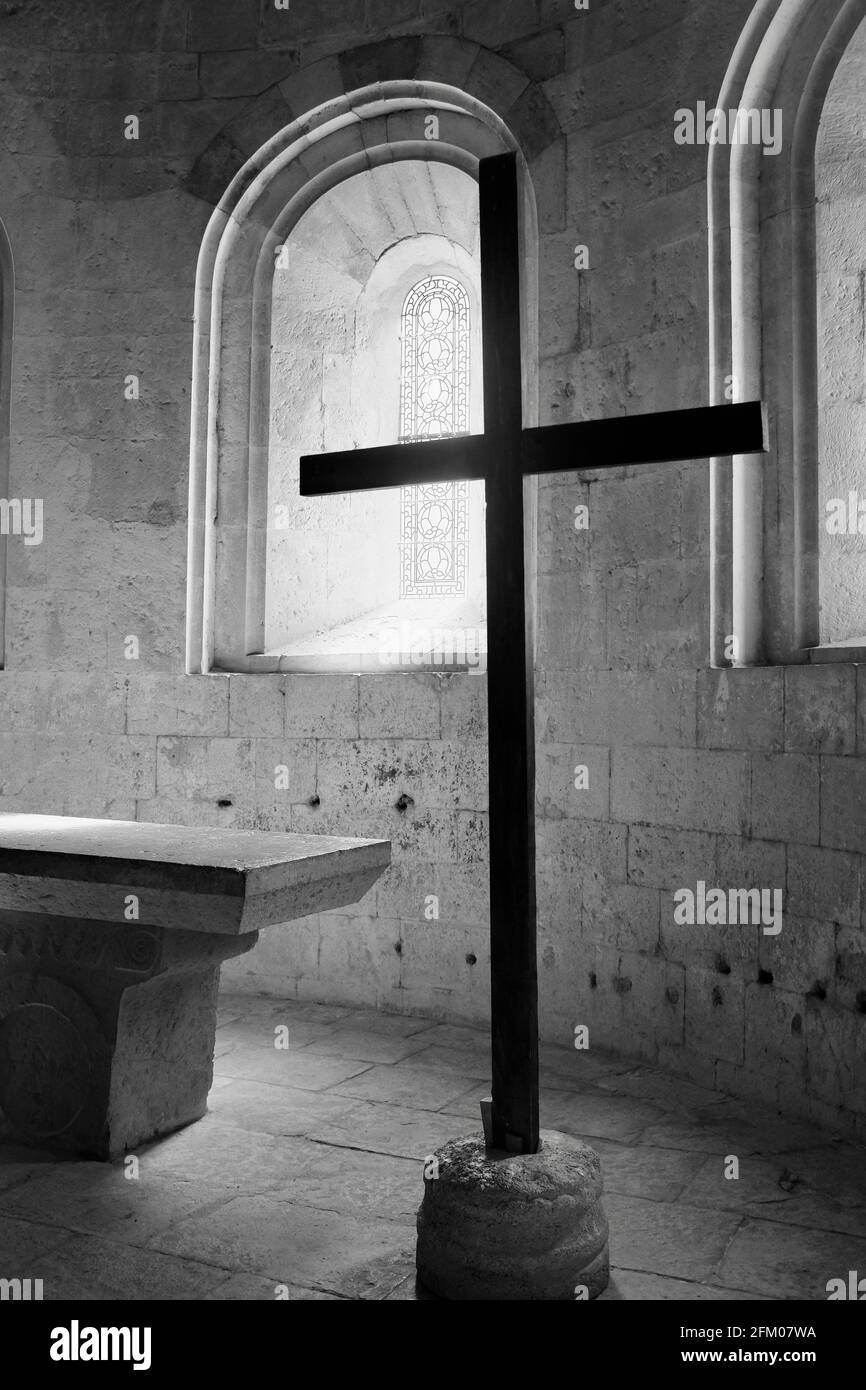 Cross backlight by sun streaming through stained glass windows, Abbaye ...