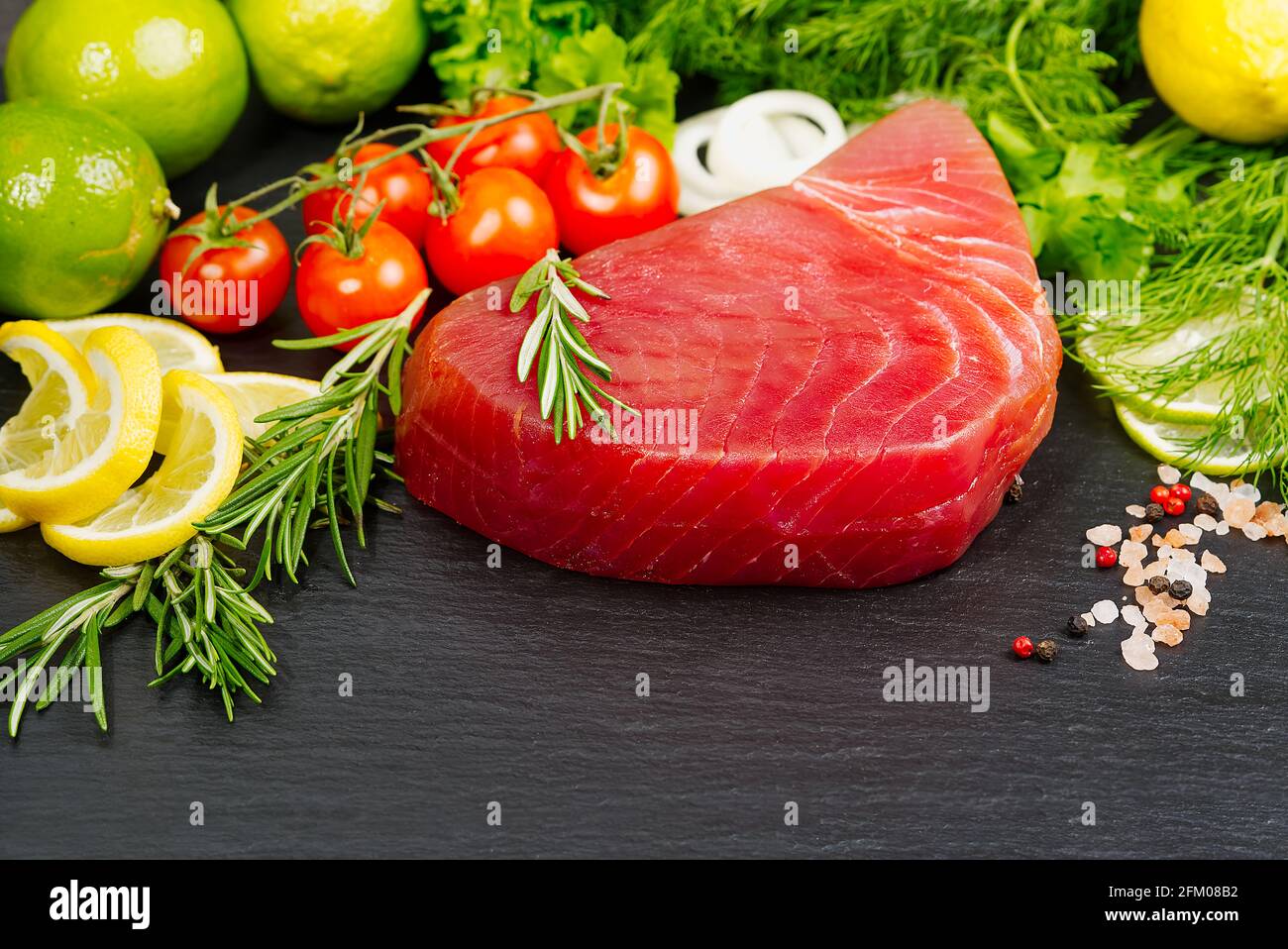 Tuna raw Steak, tuna sashimi, tuna fish sliced with vegetables. healthy ...