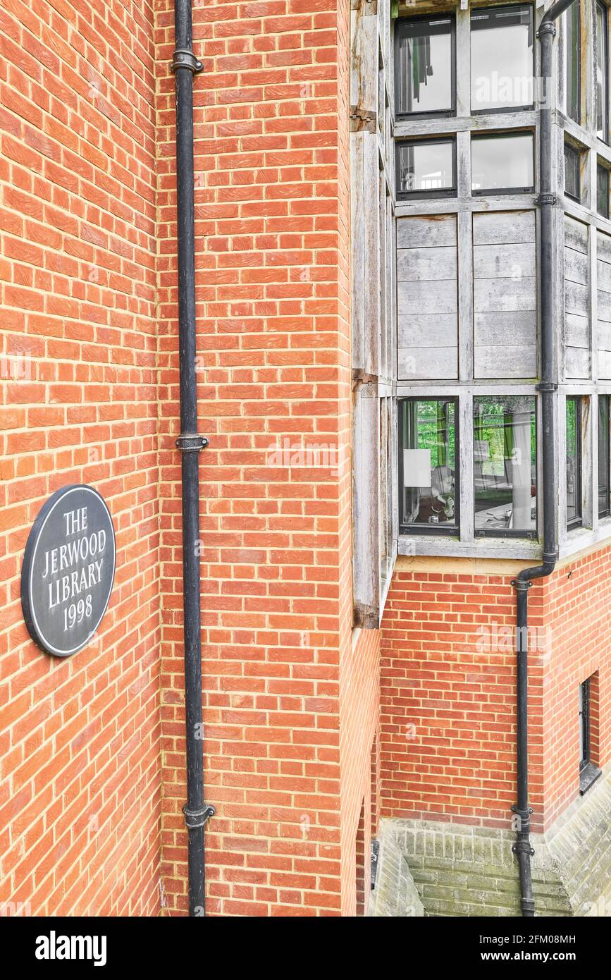 A student studying in the Jerwood library, Trinity Hall college ...
