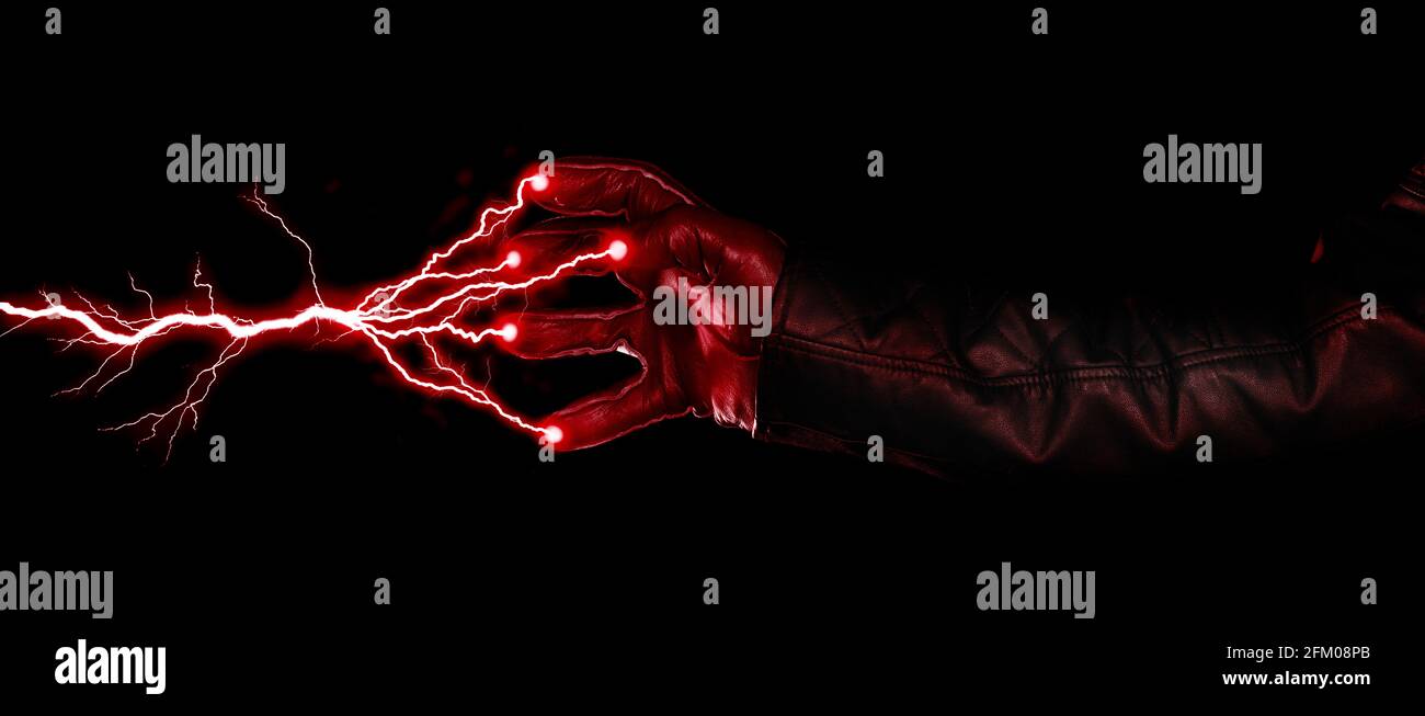 Hand shooting out a bolt of lightning - Dark and mysterious, isolated ...