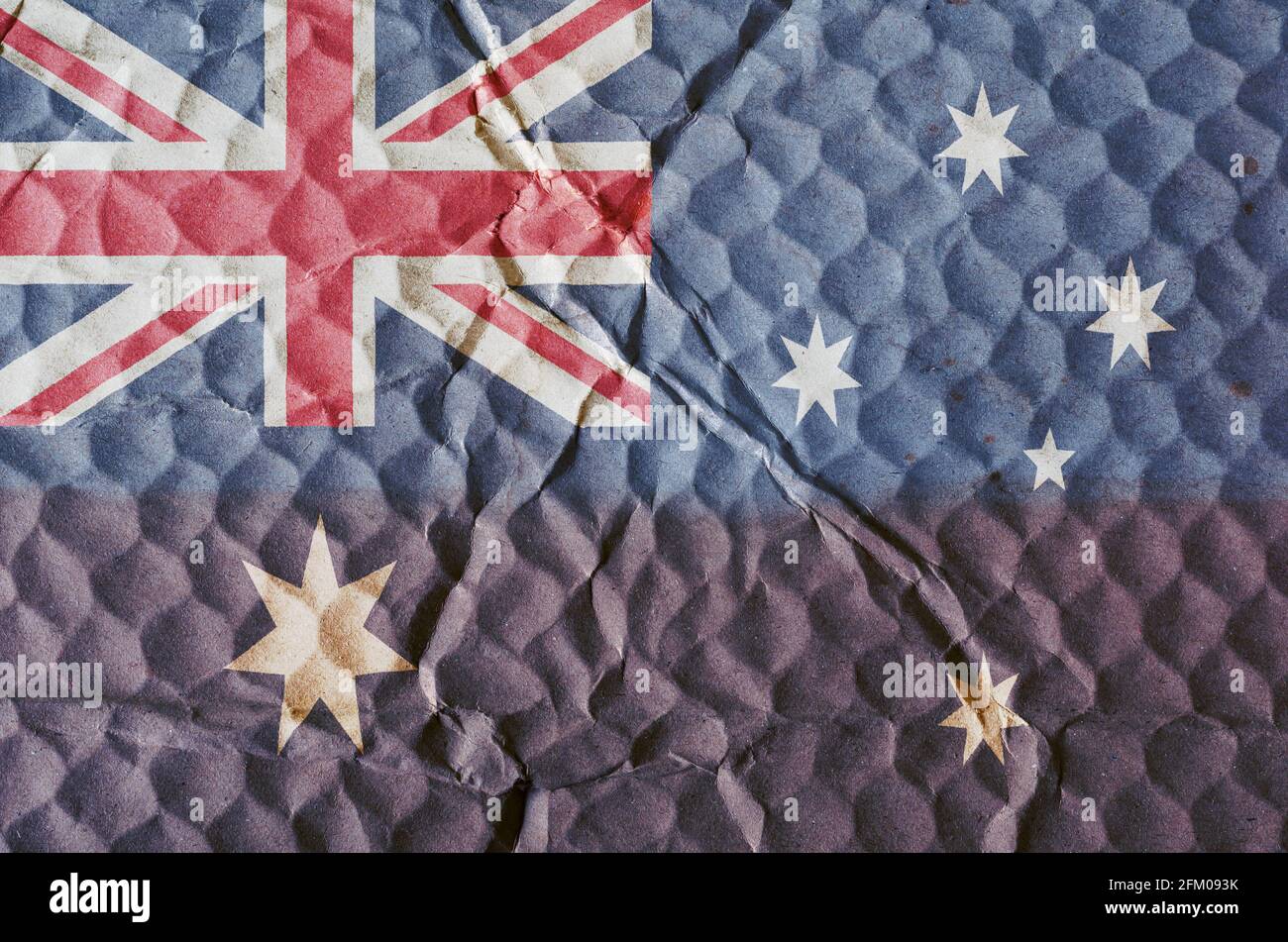 Australian national flag on uneven textured surface. The concept of ...