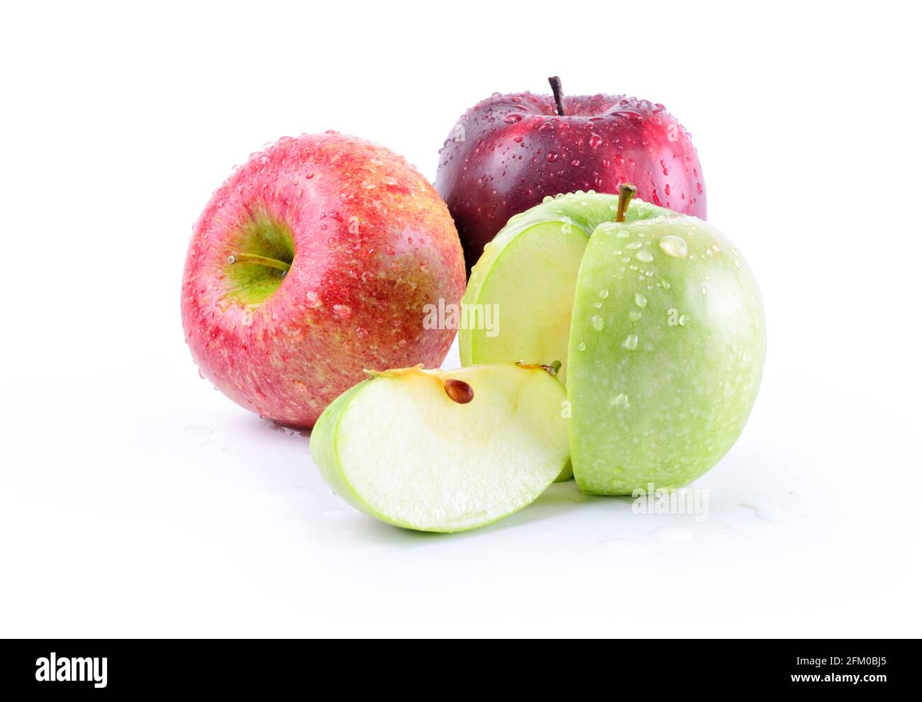 Three very fresh apples with water droplets: stark delicious, granny ...