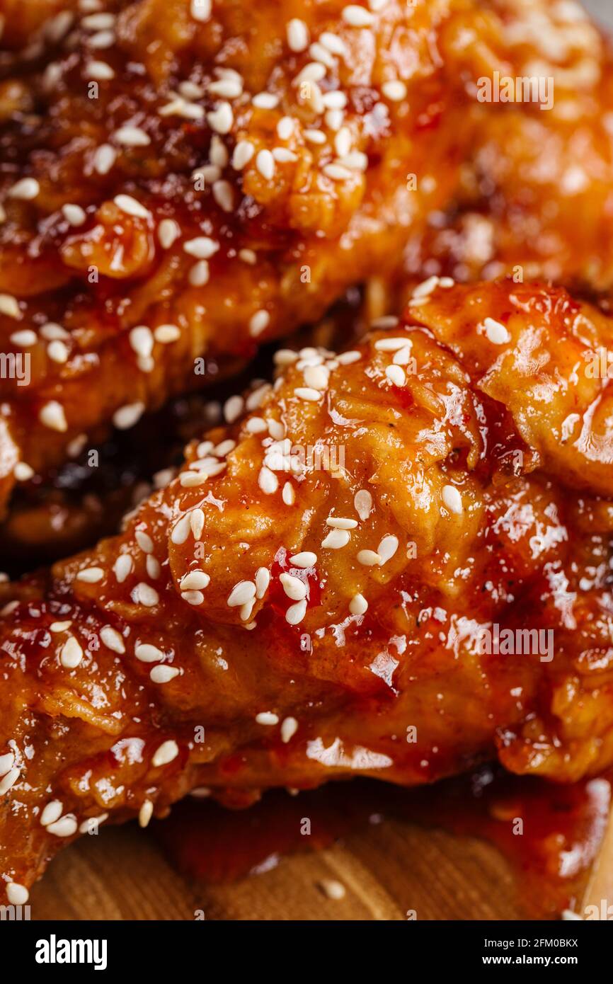 Closeup on asian fried chicken wings texture Stock Photo - Alamy