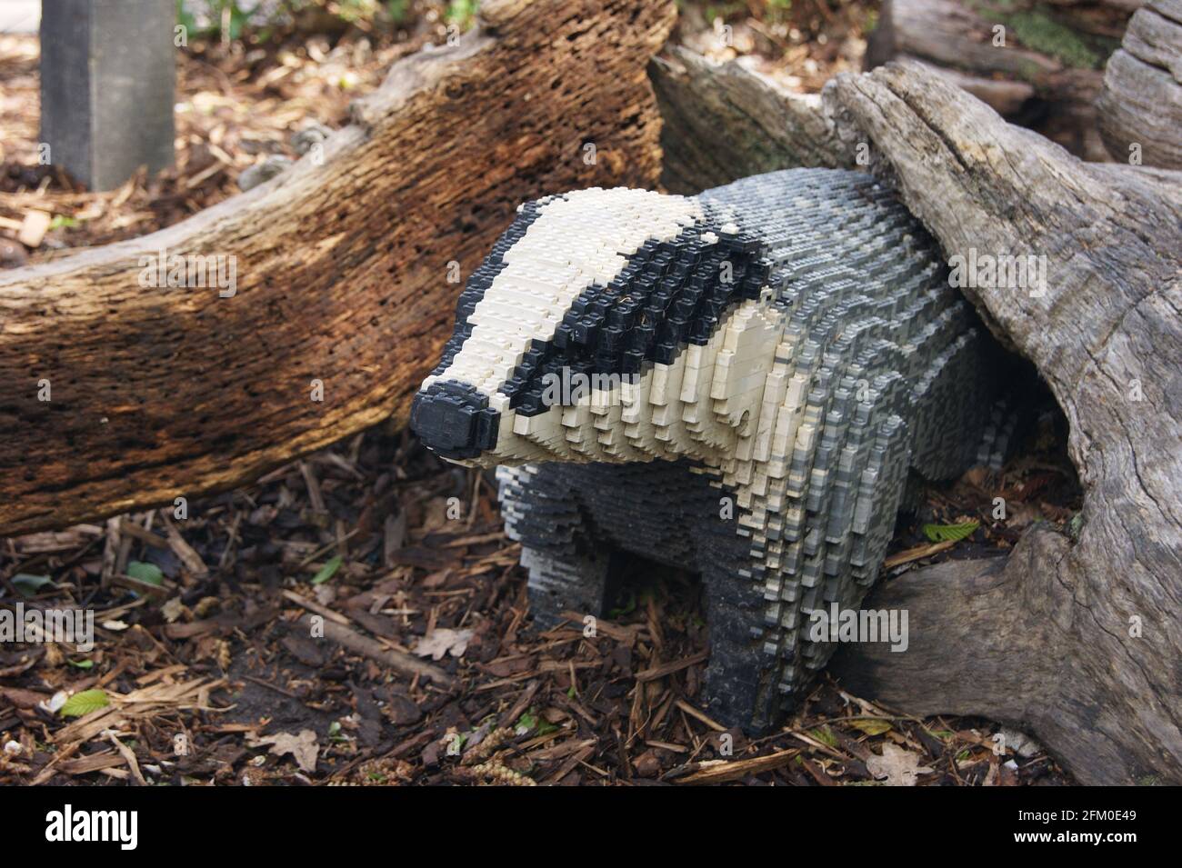 Legoland Windsor Badger In Log Stock Photo - Alamy