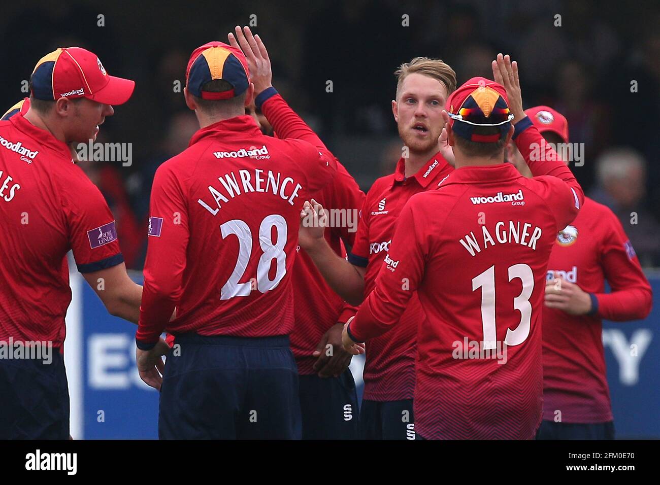Jamie Porter of Essex celebrates with his team mates after taking the ...