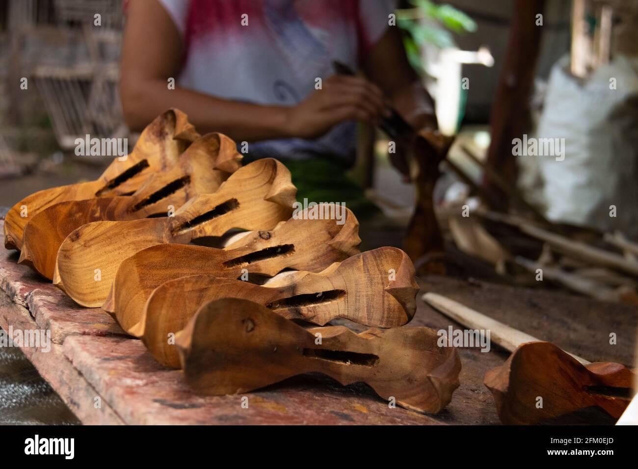 making a traditional keris handle using wood Stock Photo - Alamy