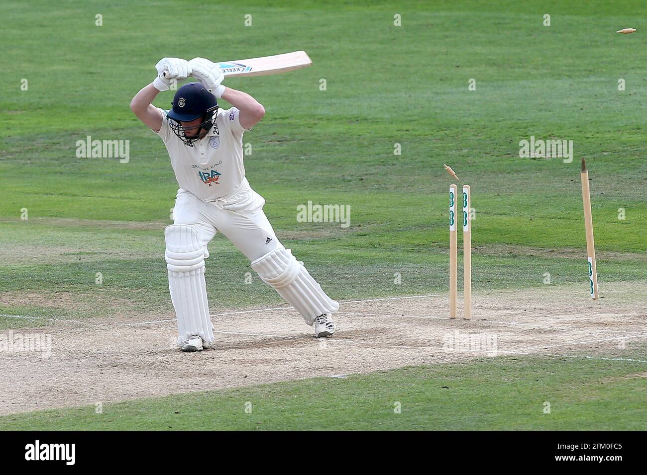 Tom Alsop of Hampshire is bowled out by Sam Cook during Essex CCC vs ...