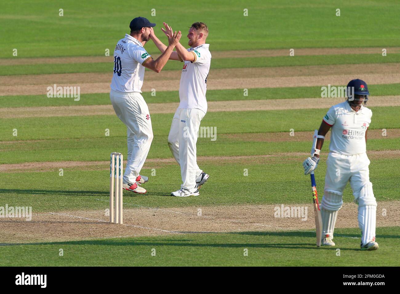 Jamie Porter of Essex celebrates taking the wicket of Shivnarine ...
