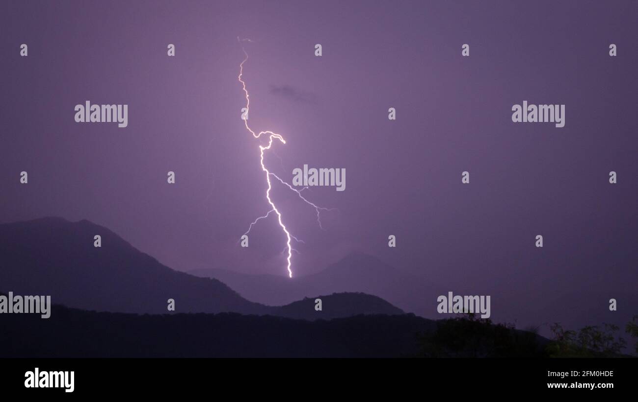 Lightning in village Stock Photo - Alamy