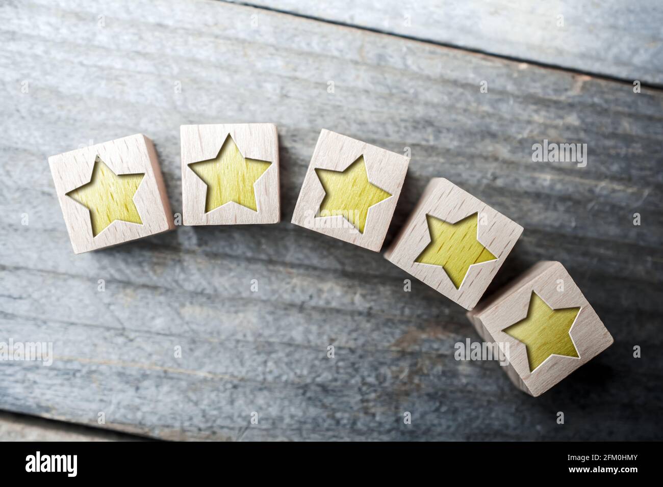 Curved 5 Star Ranking Formed By Wooden Blocks On A Board - Top ...