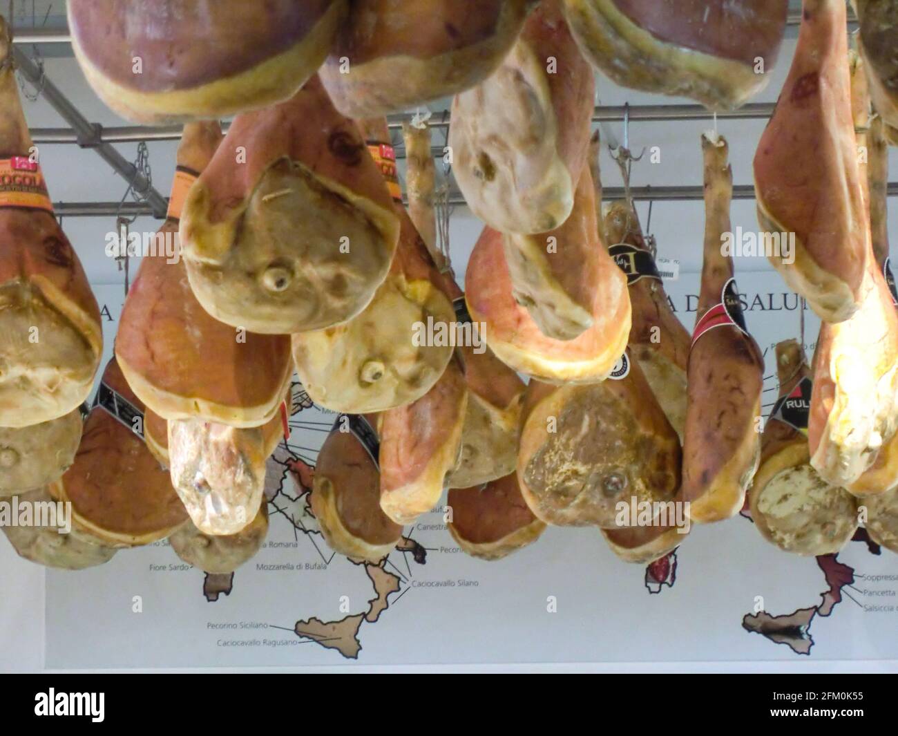 Hanging prosciutto hi-res stock photography and images - Alamy