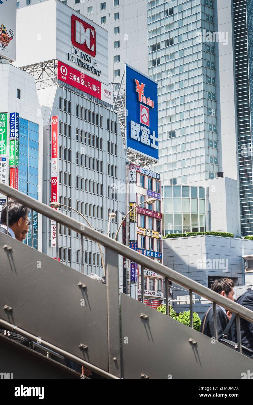 Skyscrapers and business buildings in the Shibuya district of Tokyo ...