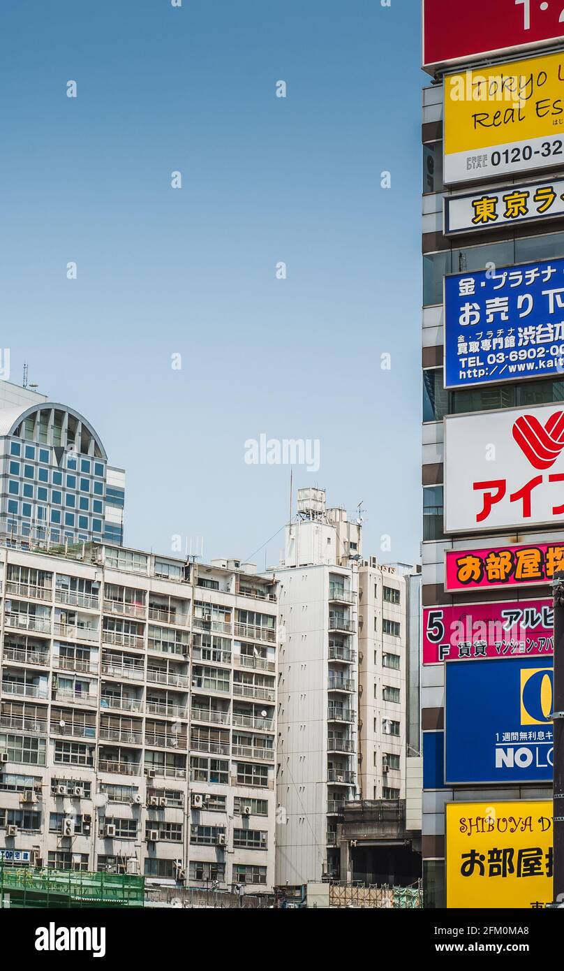 Skyscrapers and business buildings in the Shibuya district of Tokyo ...