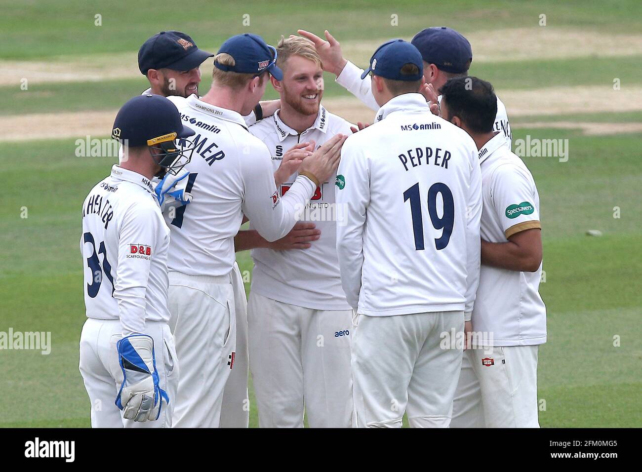 Jamie Porter of Essex celebrates with his team mates after taking the ...