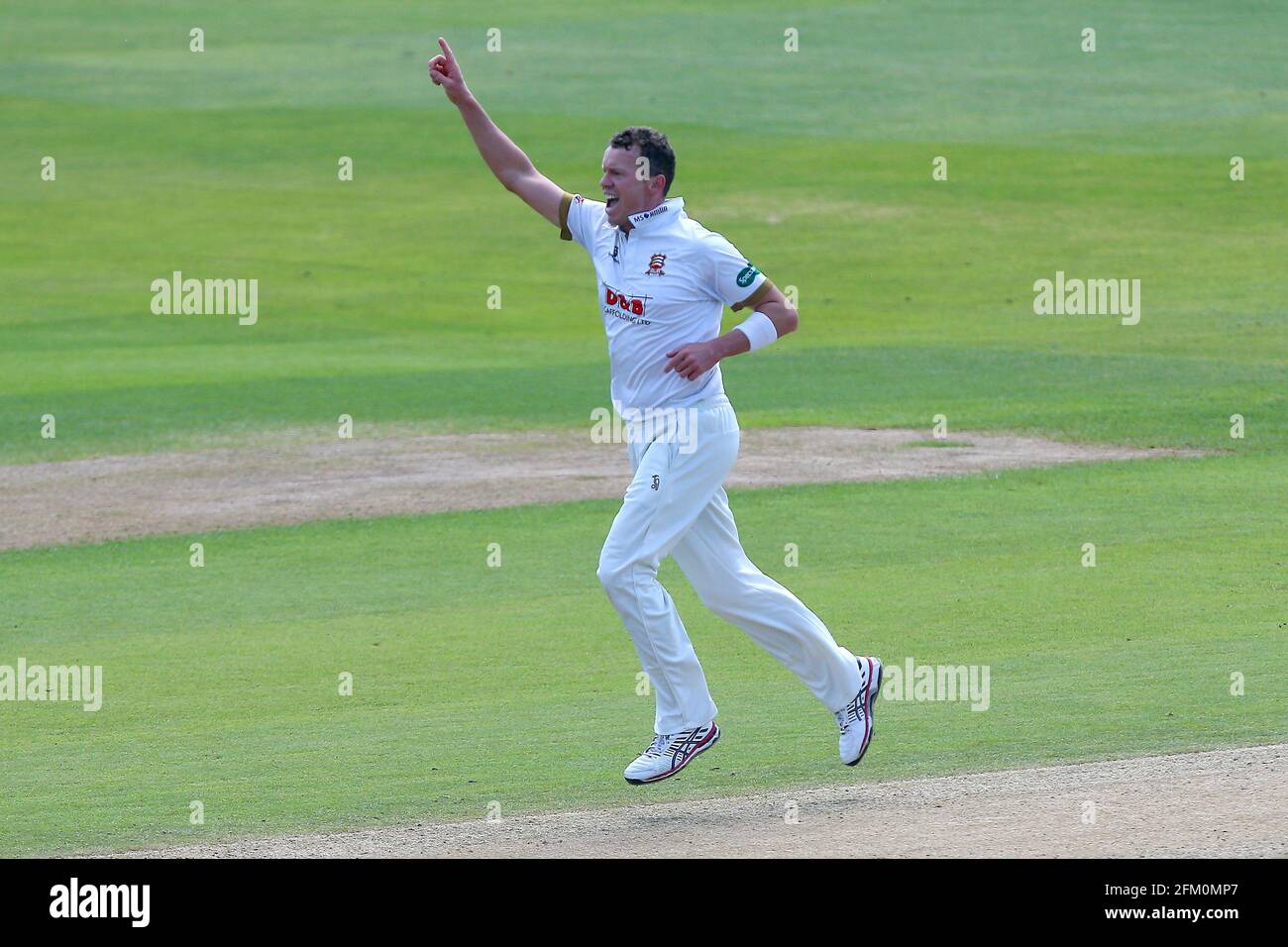 Peter Siddle of Essex celebrates taking the wicket of Gary Ballance ...