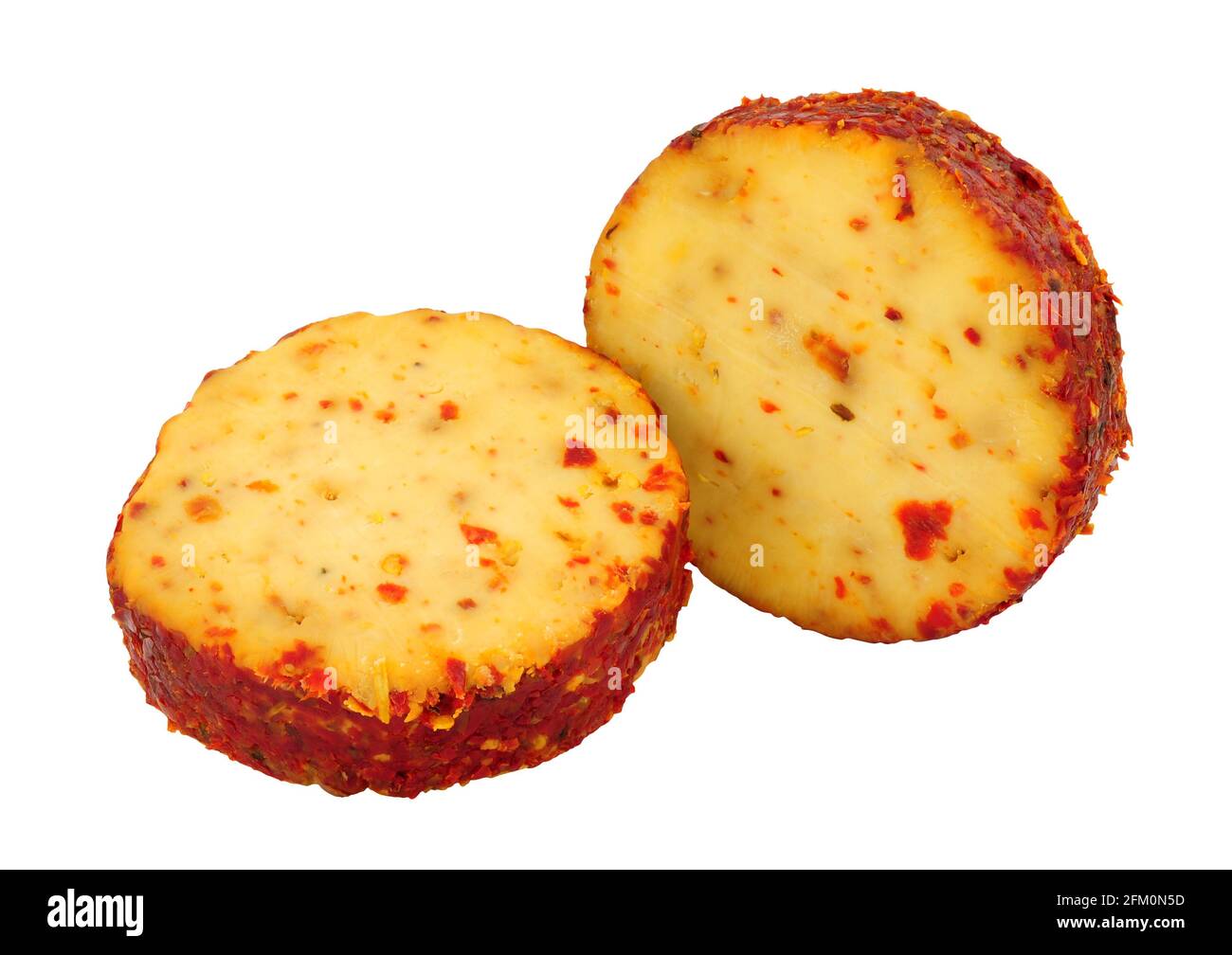 Oak smoked jalapeno and red pepper cheddar cheese isolated on a white ...