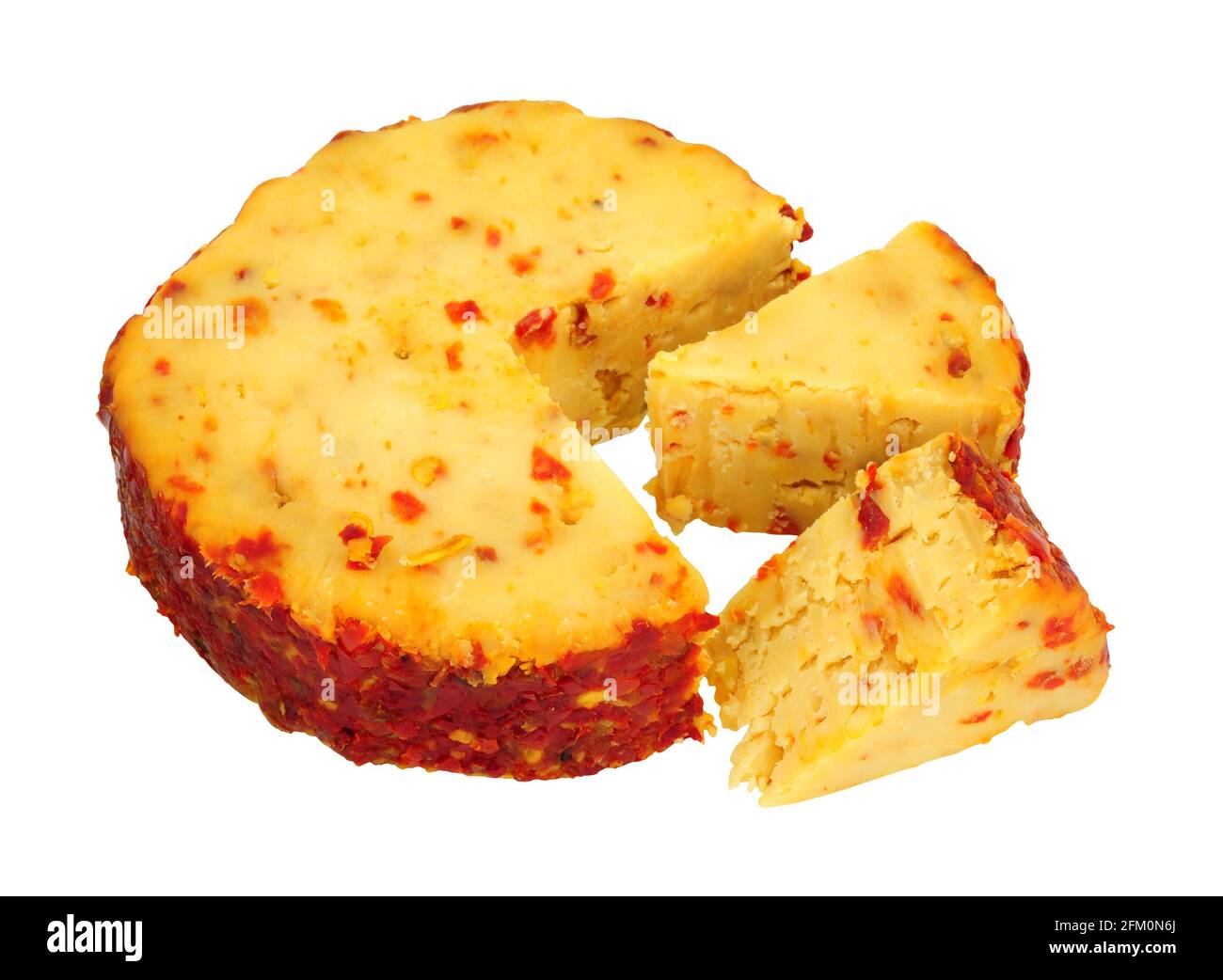 Oak smoked jalapeno and red pepper cheddar cheese isolated on a white ...