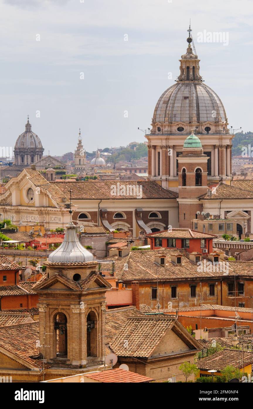 Panoramic view to Rome rooftops with catholic basilics and monuments ...