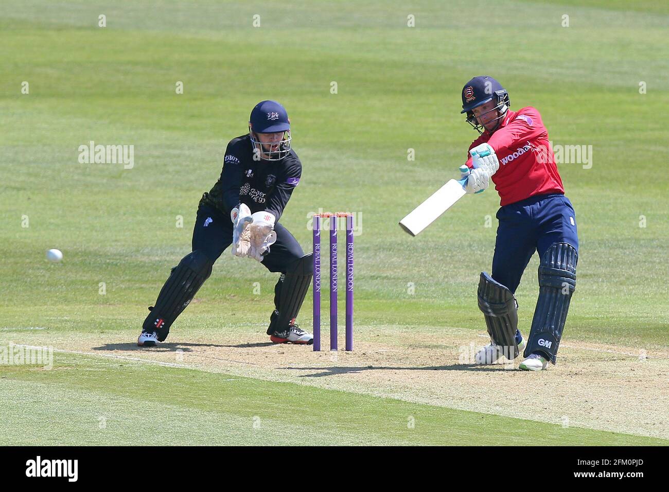 Adam Wheater hits 4 runs for Essex as Gareth Roderick looks on from ...