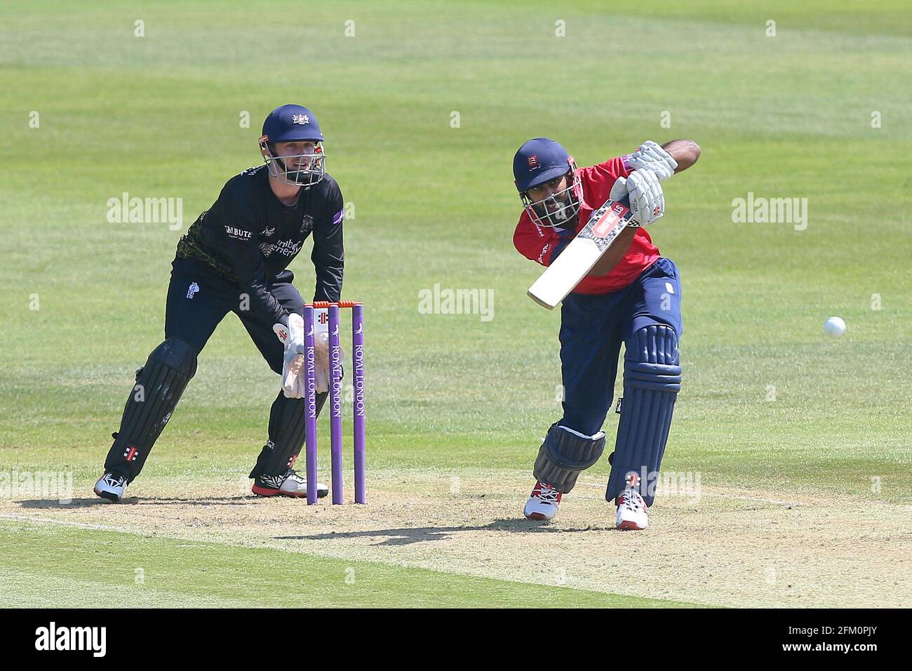 Varun Chopra in batting action for Essex as Gareth Roderick looks on ...