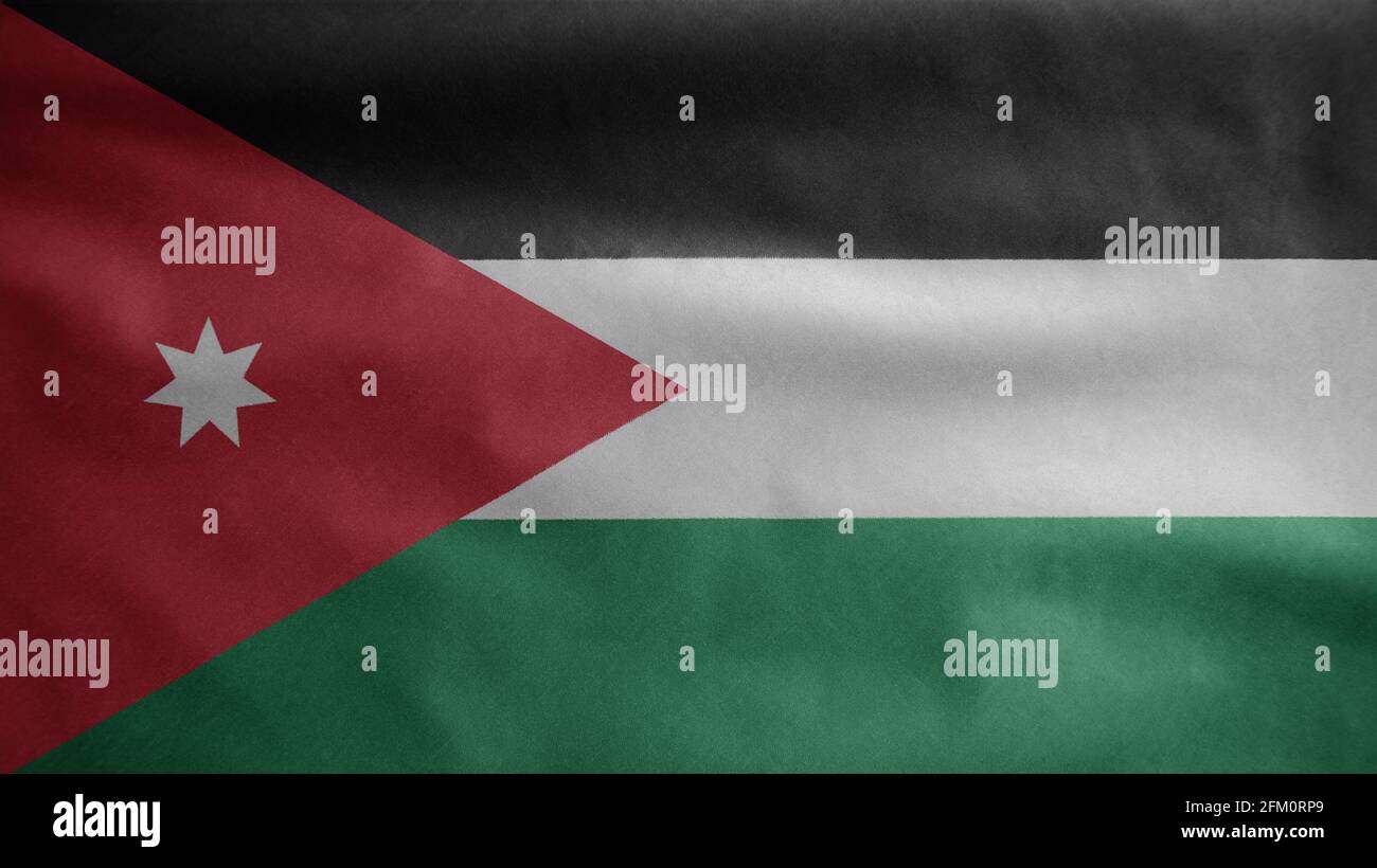 Jordan flag waving in the wind. Close up of Jordania banner blowing ...