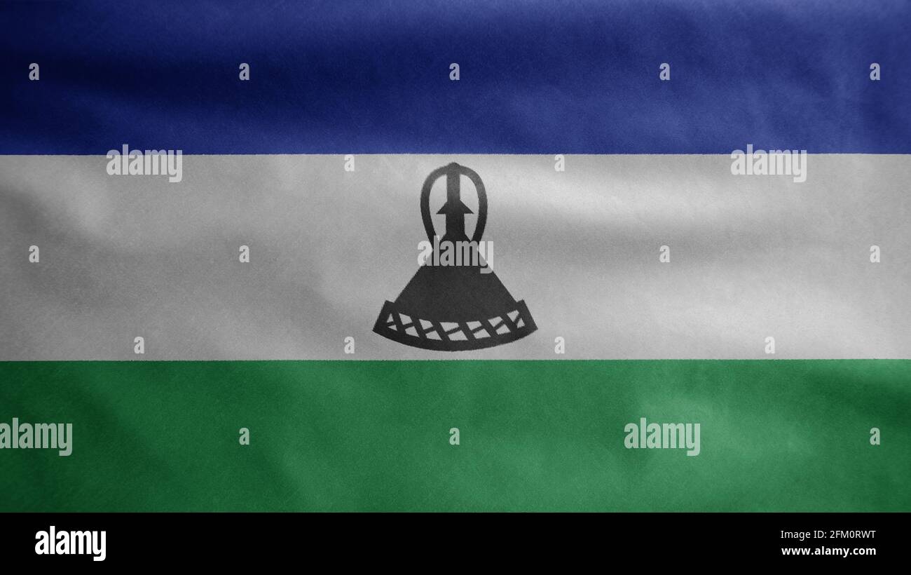 Lesotho flag waving in the wind. Close up of Sesotho banner blowing ...