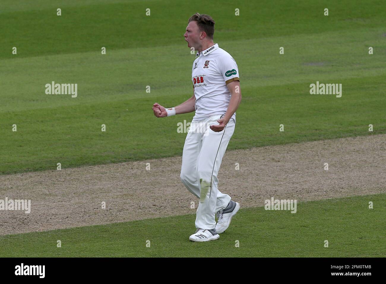 Sam Cook of Essex celebrates taking the wicket of Liam Livingstone ...