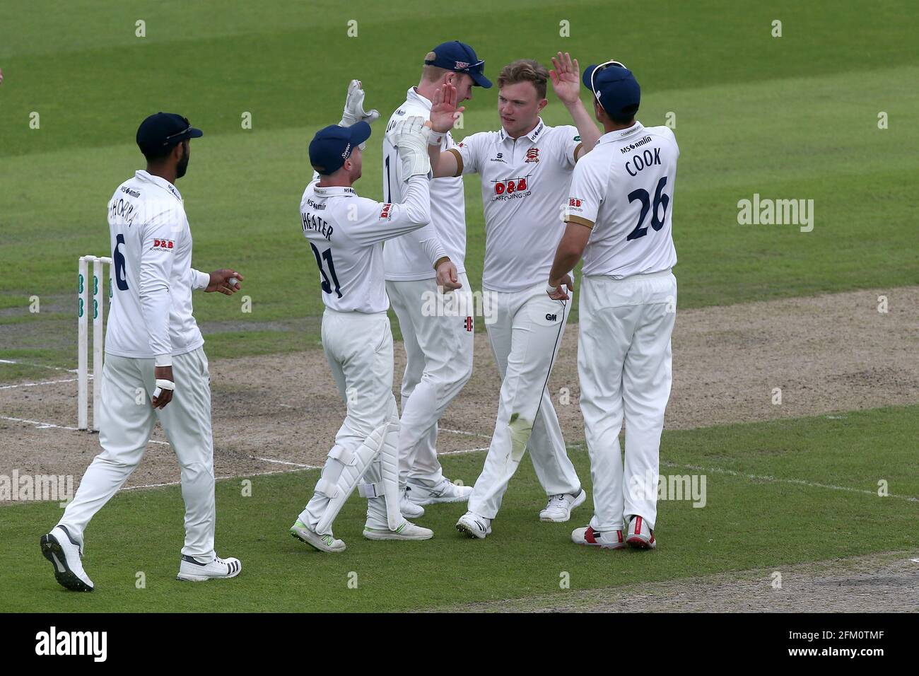 Sam Cook of Essex celebrates taking the wicket of Liam Livingstone ...