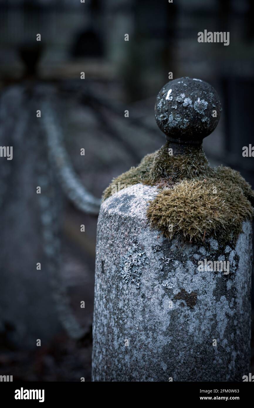 part of the fence from the granite pillar and the iron chain in the ...
