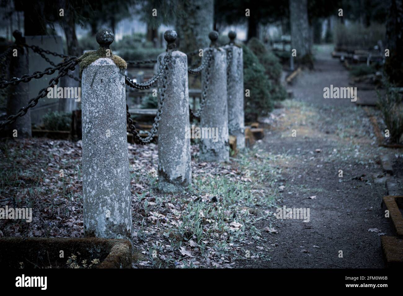part of the fence from the granite pillar and the iron chain in the ...