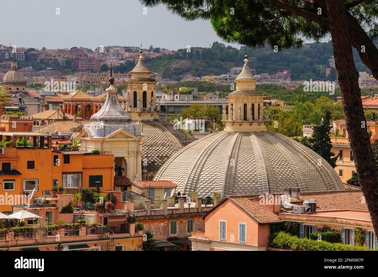 Panoramic view to Rome rooftops with catholic basilics and monuments ...