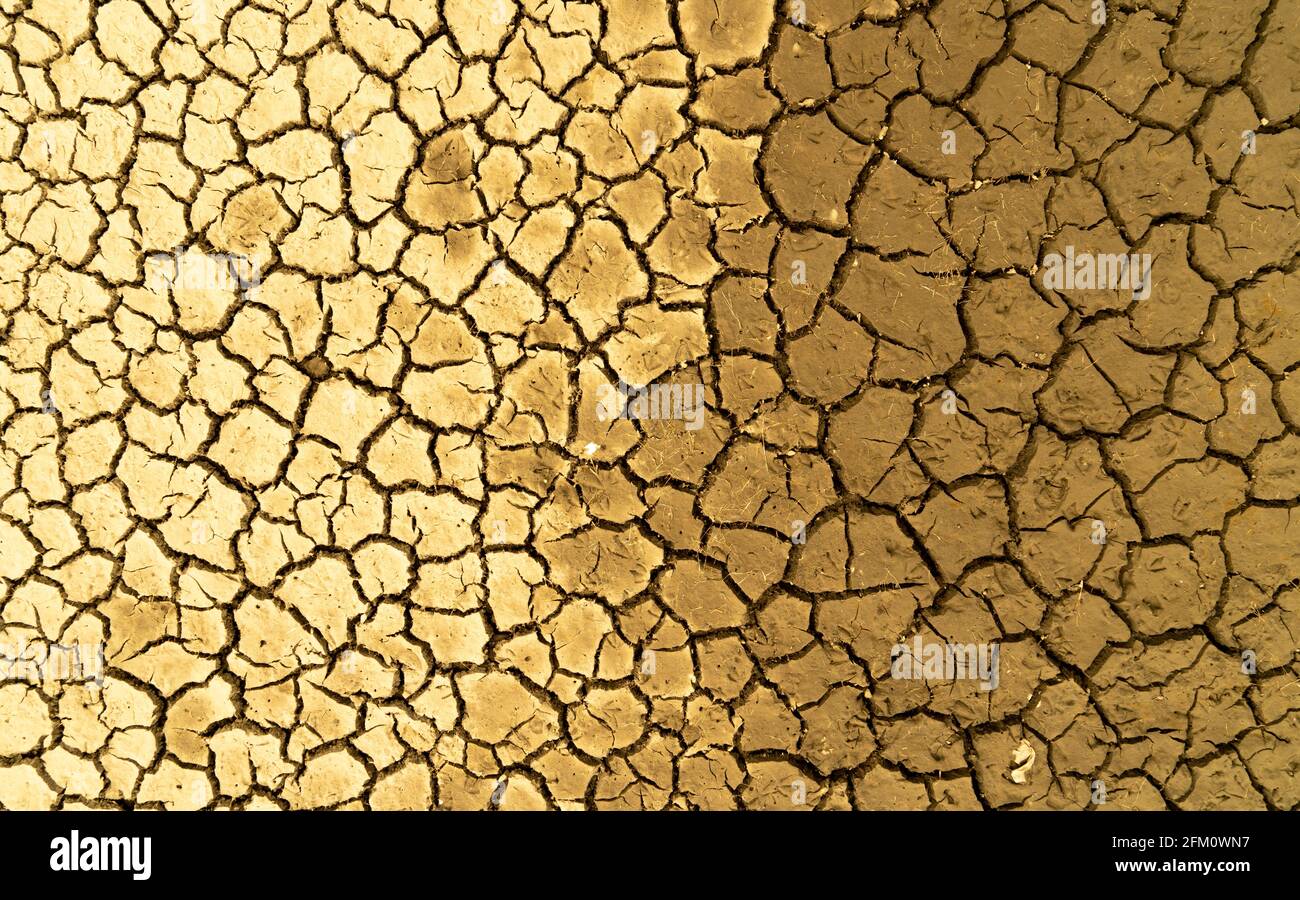 Mudflat cracked desert barren surface for natural background, layer, wallpaper, photo effect ...