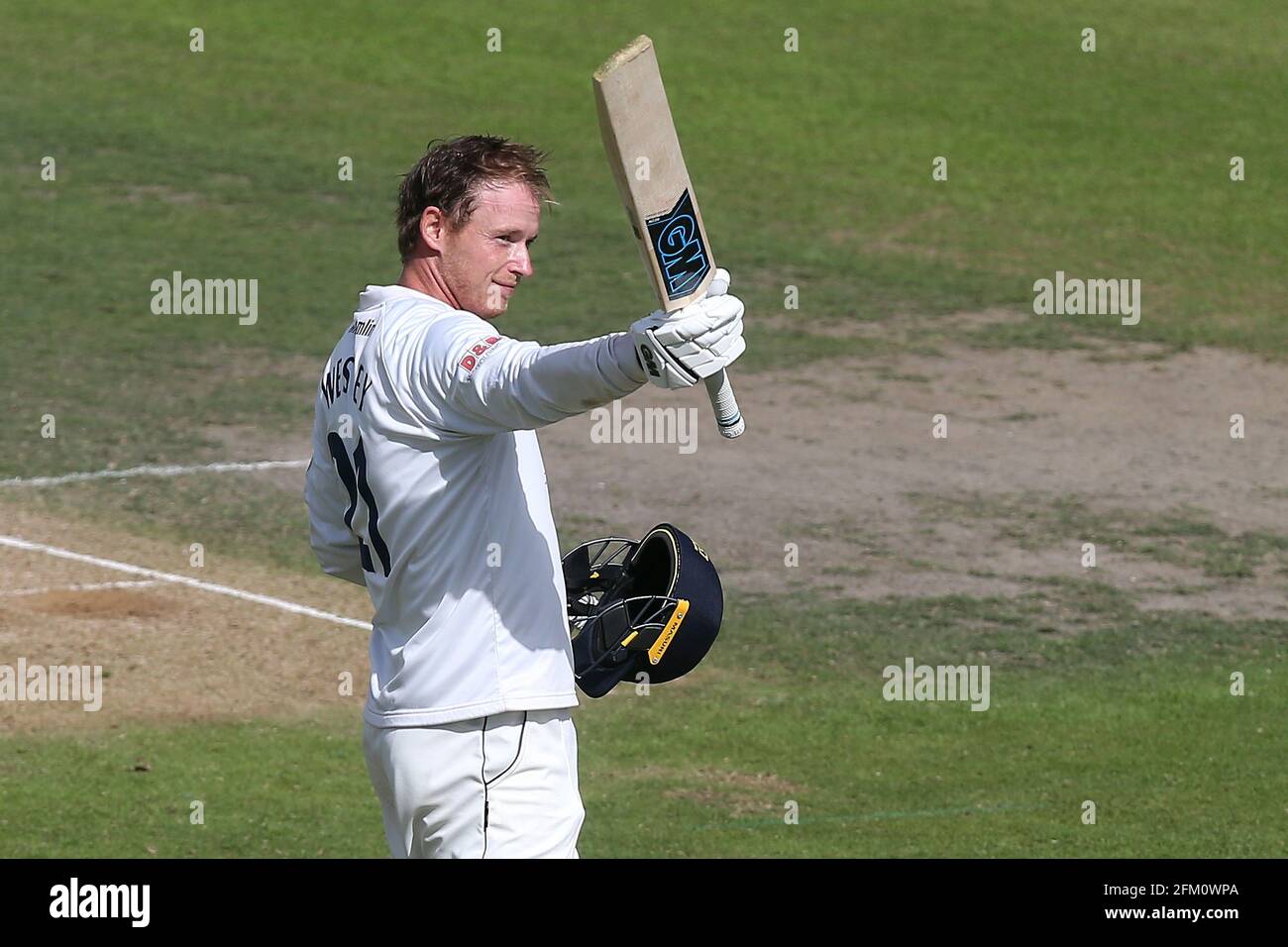 Tom Westley of Essex acknowledges the crowd after reaching his century ...