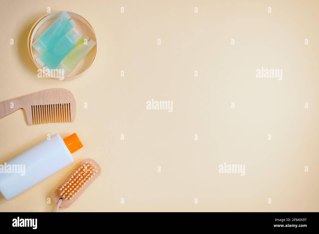 Natural cosmetics with wheat on light yellow background. Natural ...