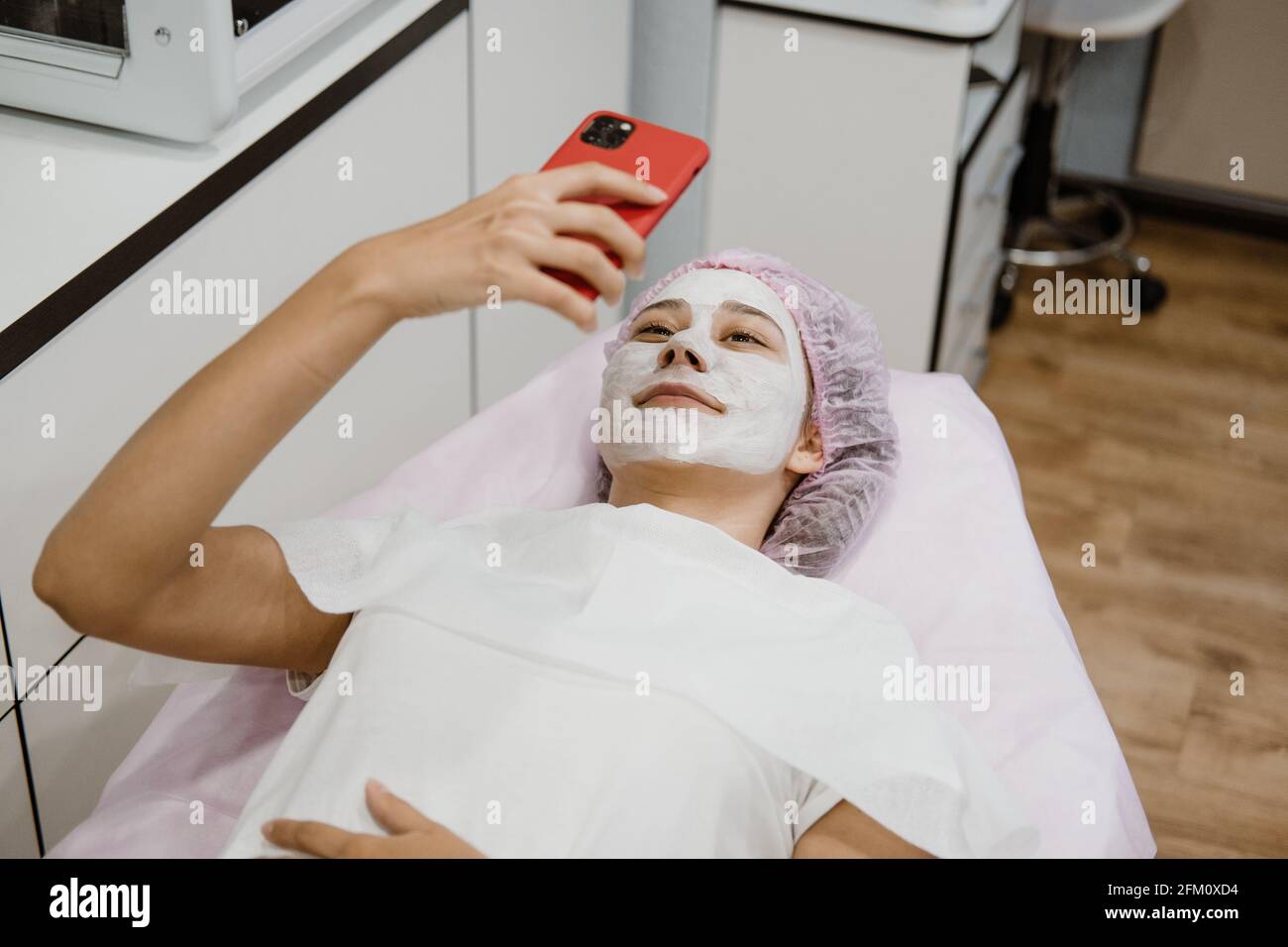 Professional facial skin care routine for teens in beauty salon ...