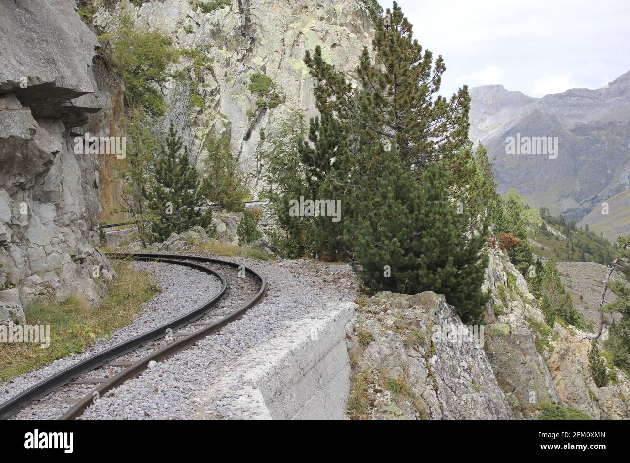Beautiful view of the railroad on a rocky cliff Stock Photo - Alamy