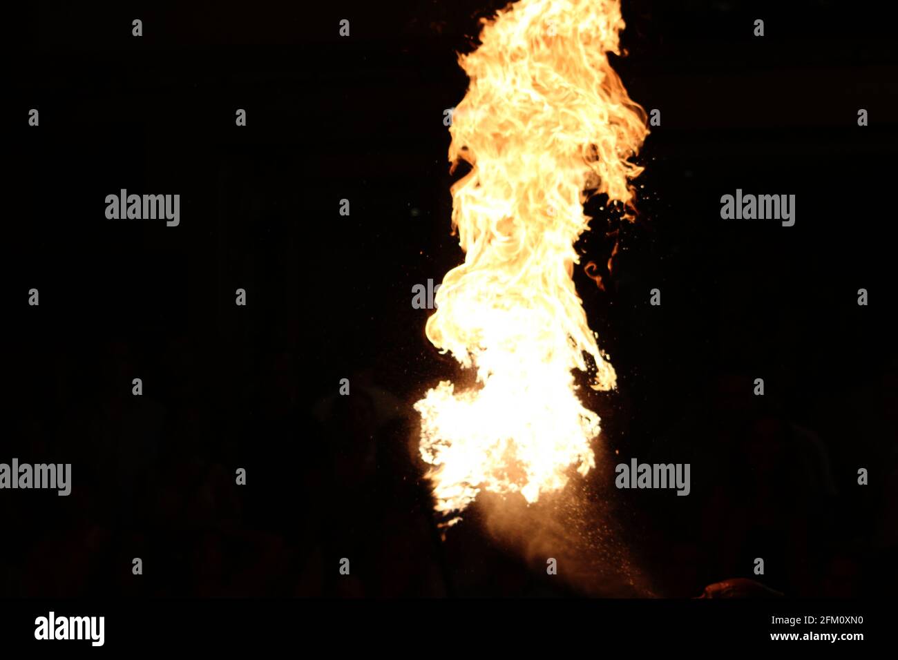 Long fire flames burning isolated on black background Stock Photo - Alamy