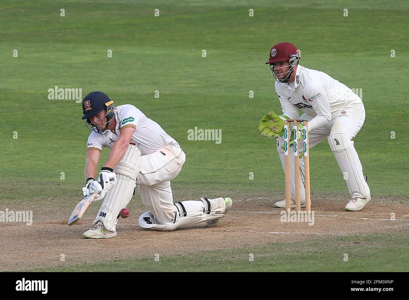 Tom Westley hits 4 runs for Essex as Steven Davies looks on from behind ...